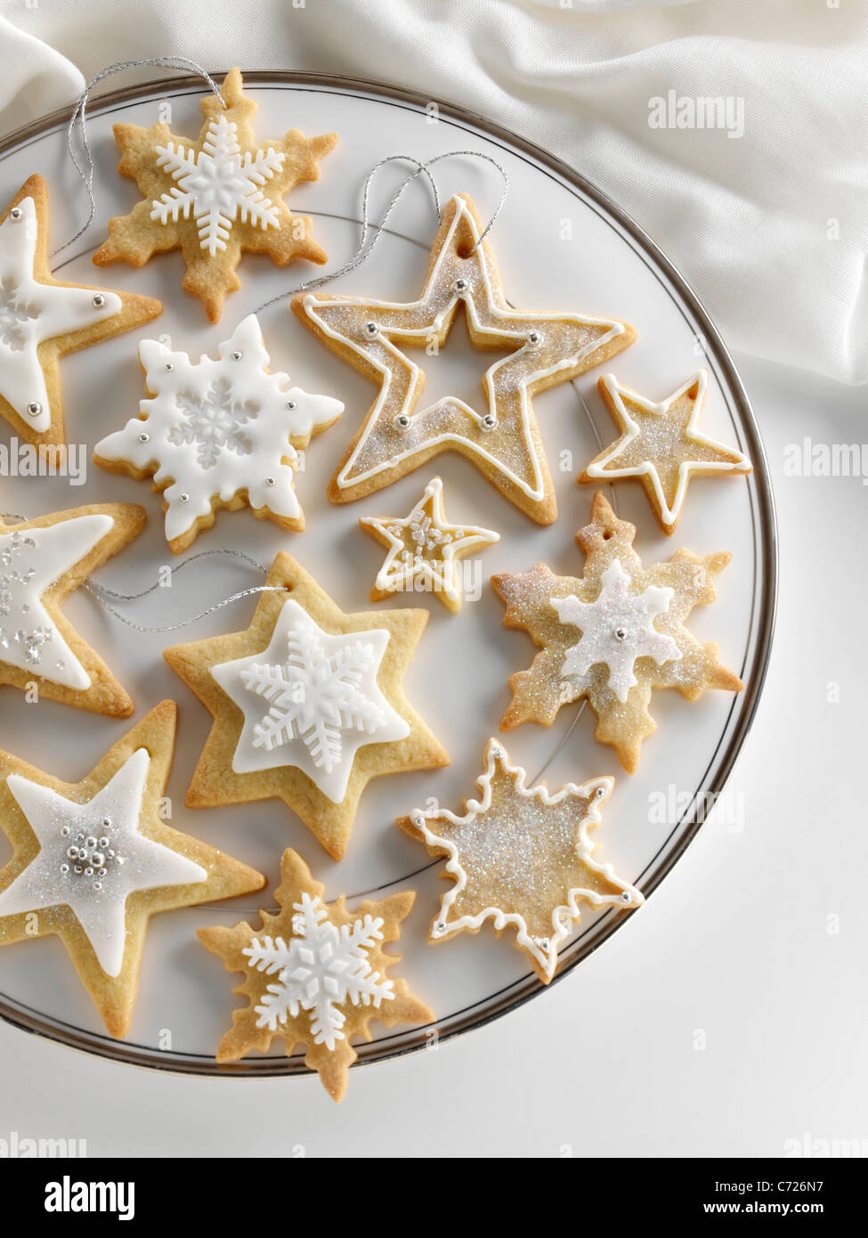 Star shaped iced Christmas biscuits Stock Photo - Alamy