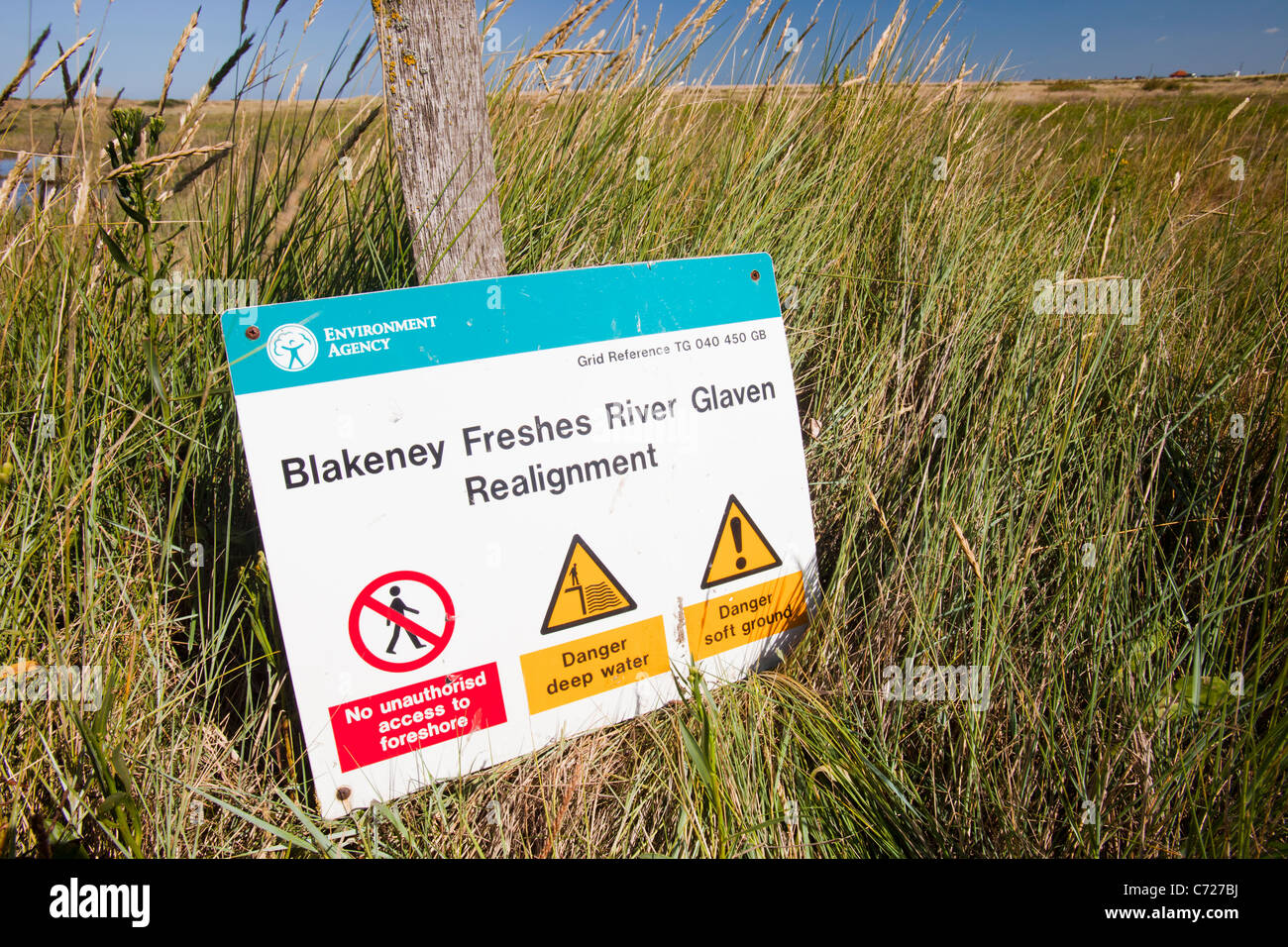 A sign about river realignment at Cley on the north Norfolk Coast, UK ...