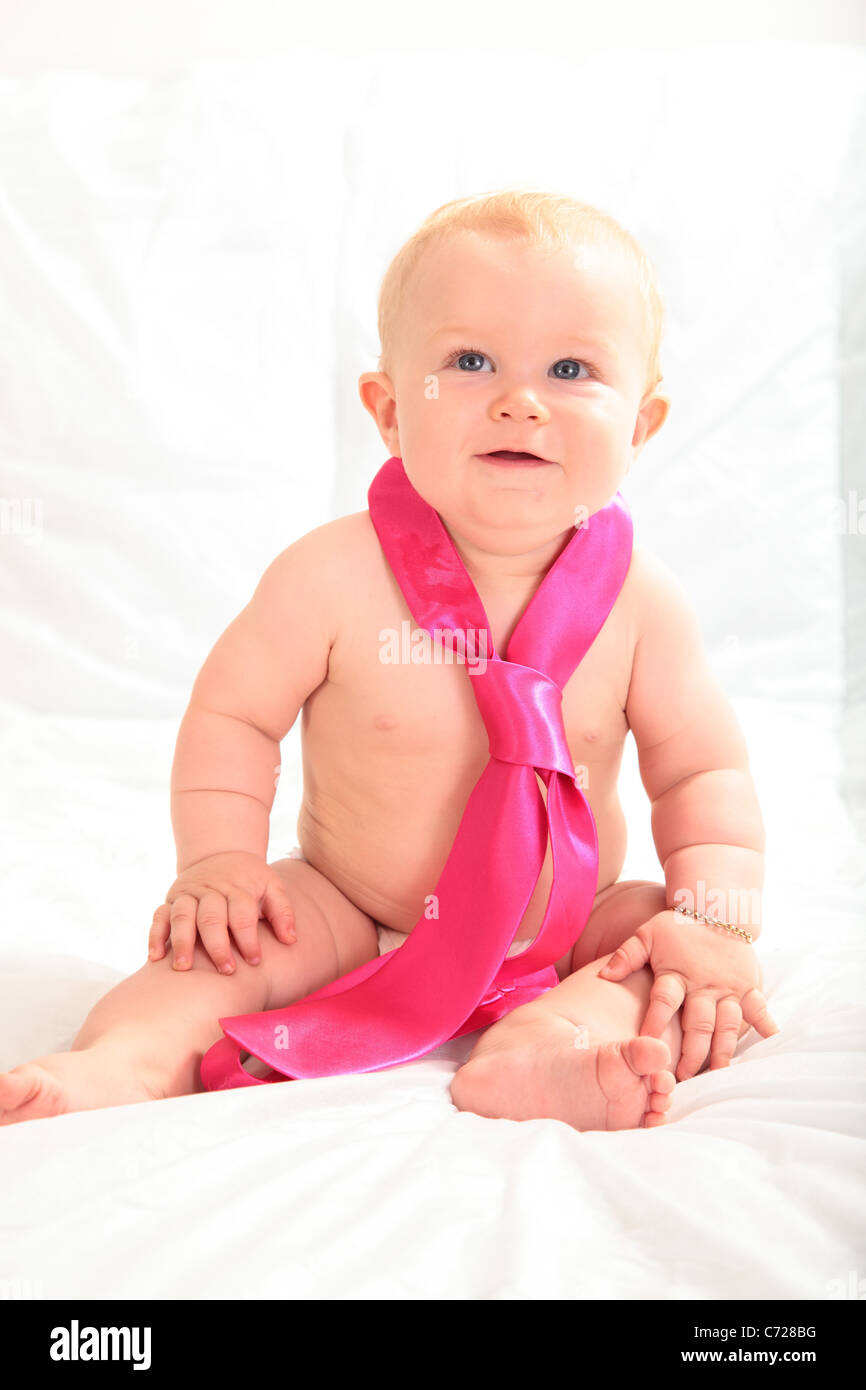 cute baby wearing a pink tie Stock Photo - Alamy
