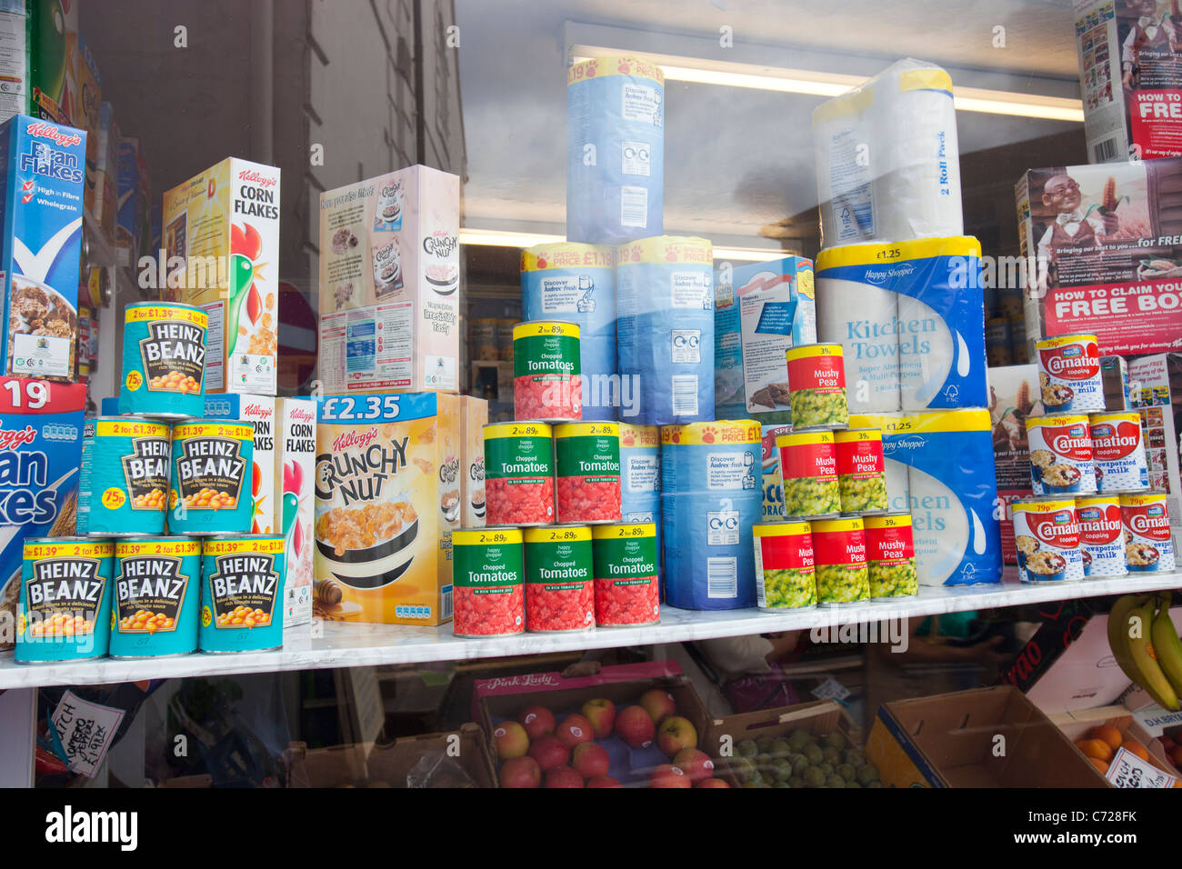 A window display in a old fashioned corner grocery shop in holt ...