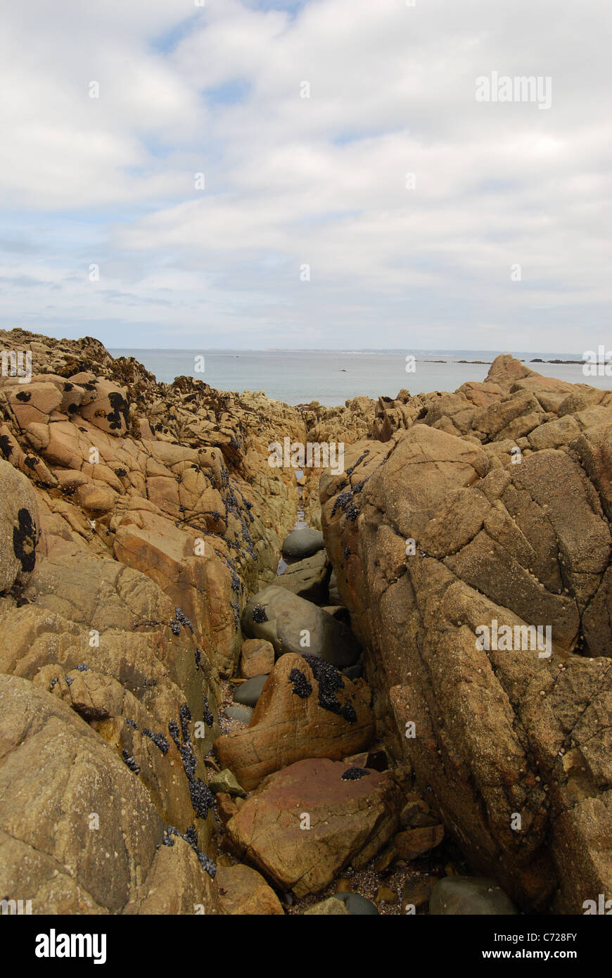 Rock formation on a beach in Brittany, France Stock Photo - Alamy