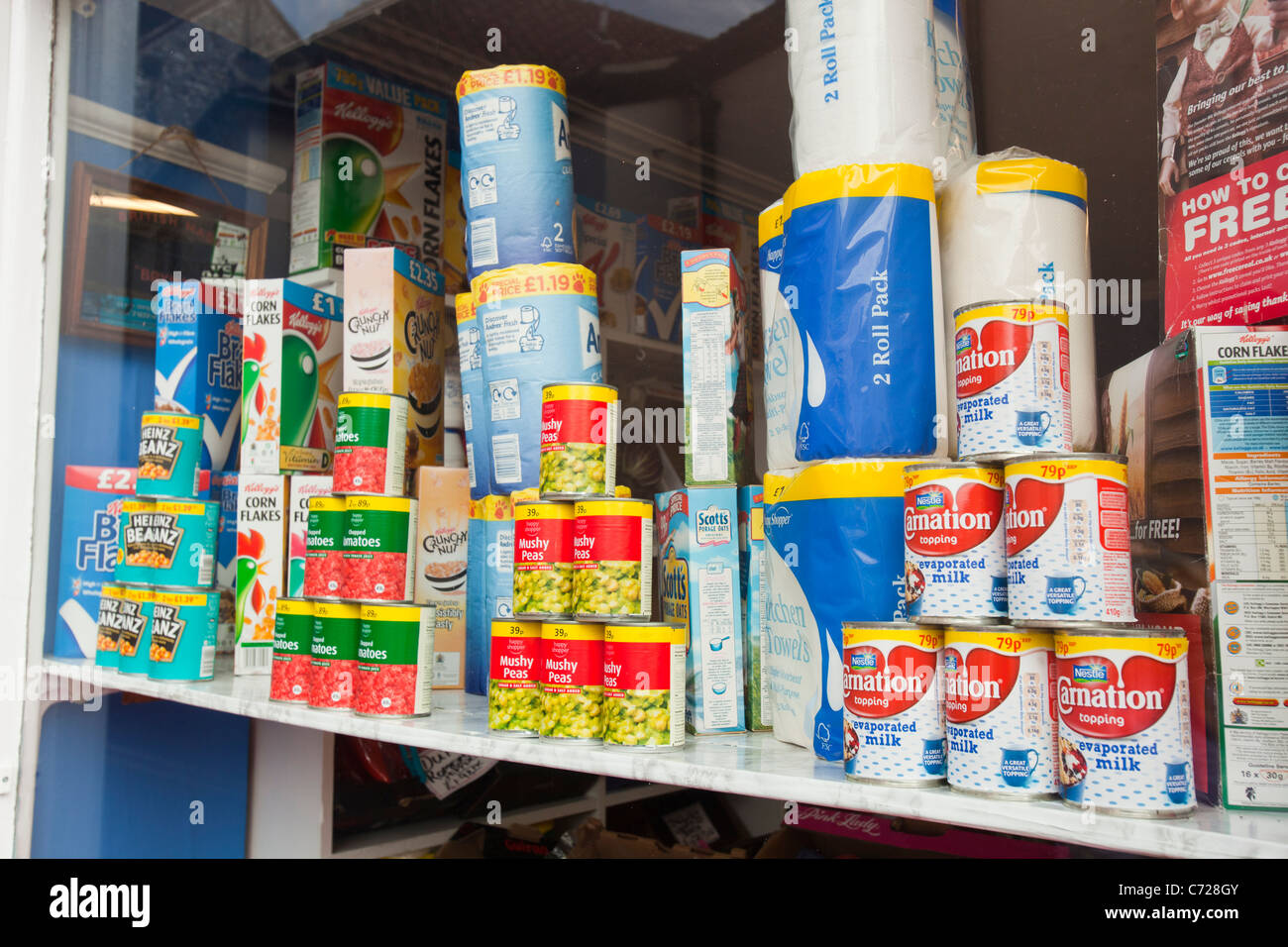 A window display in a old fashioned corner grocery shop in holt ...