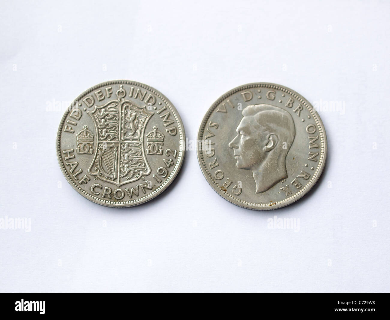 Two half crown coins from the 1940's each 2/6 pence 30 old pence or 12. ...