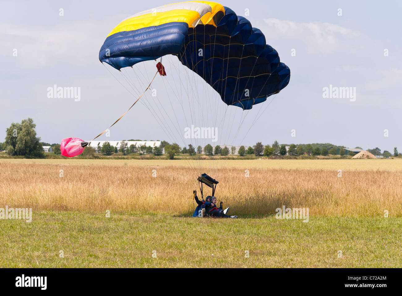 Two tandem paracute jumpers landing after being dropped off at Ellough ...