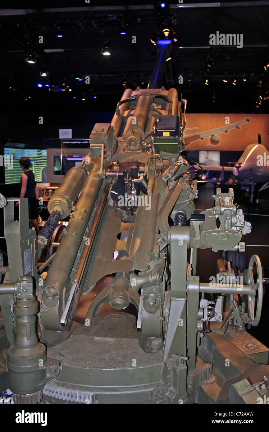 A close-up view of an artillery breach and loading system, showcasing ...