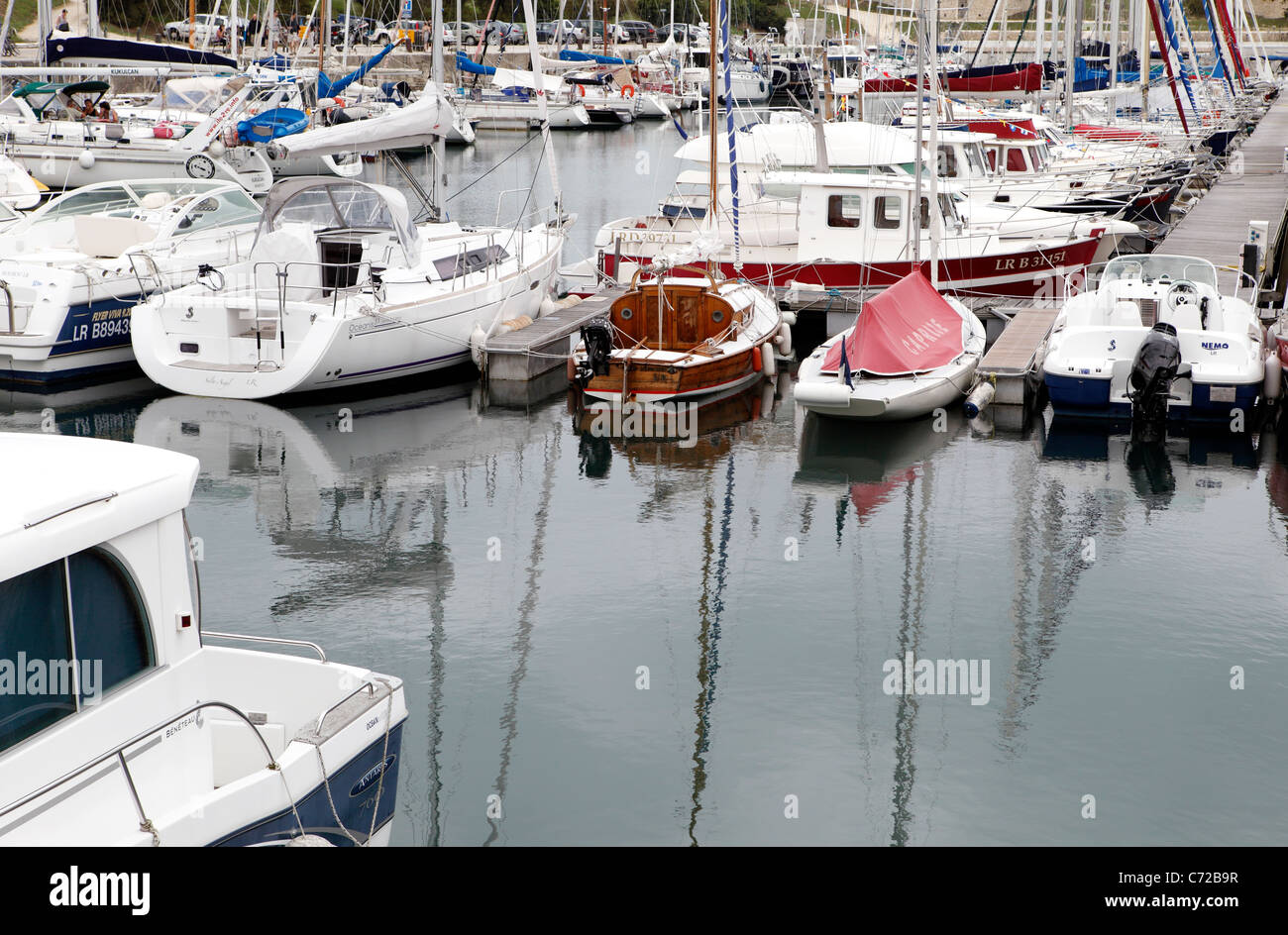 Boats lined up in a harbour in Ile de Re France Stock Photo - Alamy