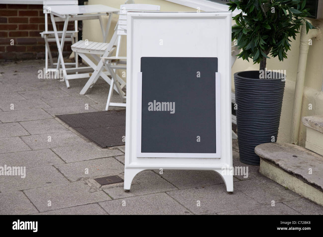 Empty Sign on Cafe Terrace Stock Photo - Alamy