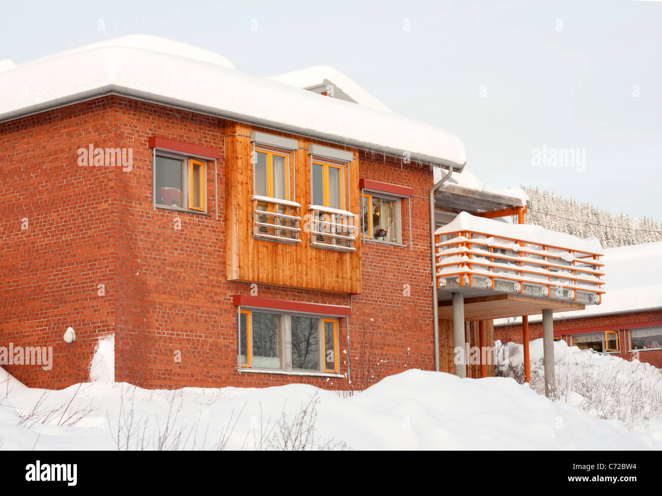 Modern building covered in snow Stock Photo - Alamy