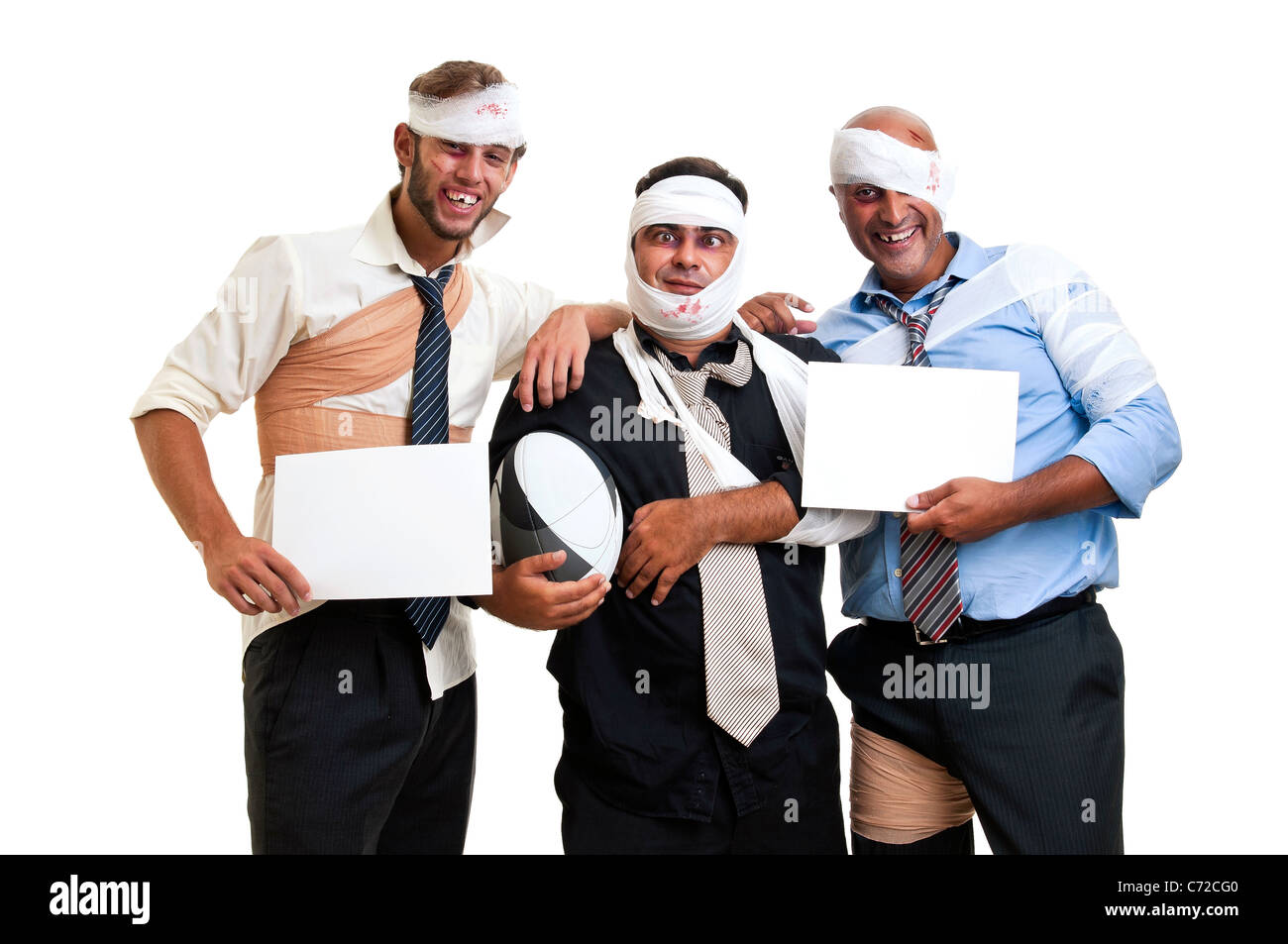 Group of injured businessmen after a rugby game with white cards Stock ...