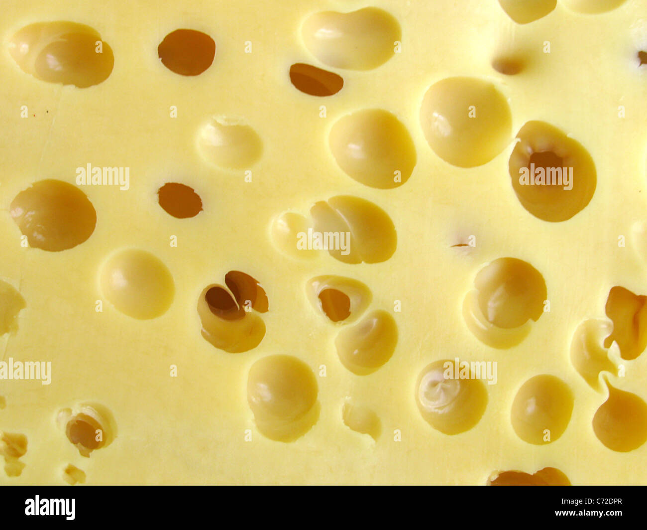 Yellow cheese holes texture hi-res stock photography and images - Alamy