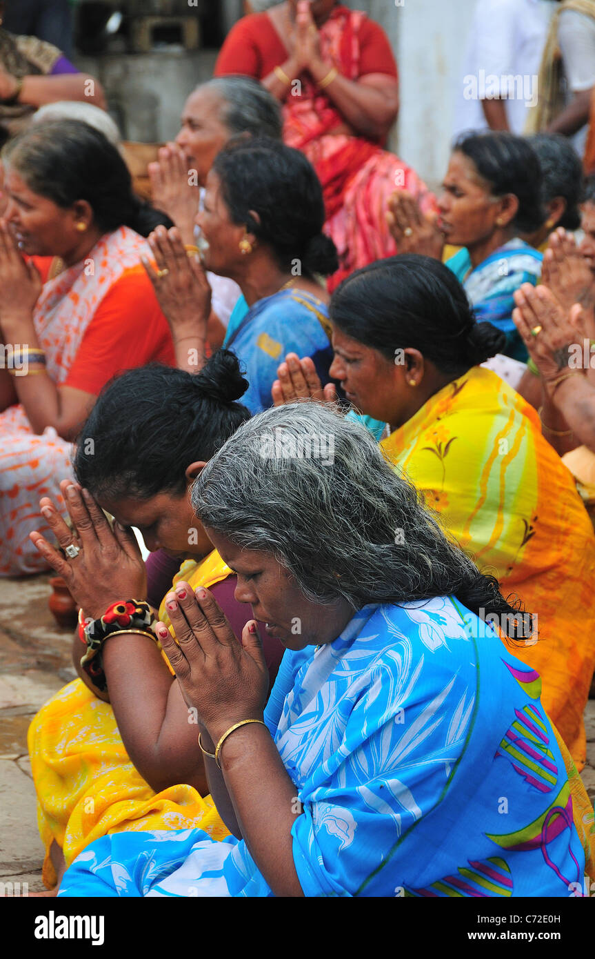 Woman praying god ghat river hi-res stock photography and images - Alamy