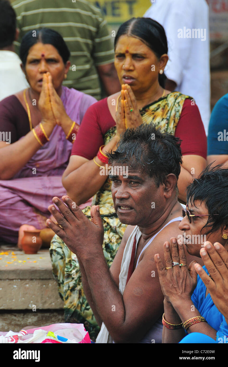 People pray for God by the holly Ganges River Stock Photo - Alamy