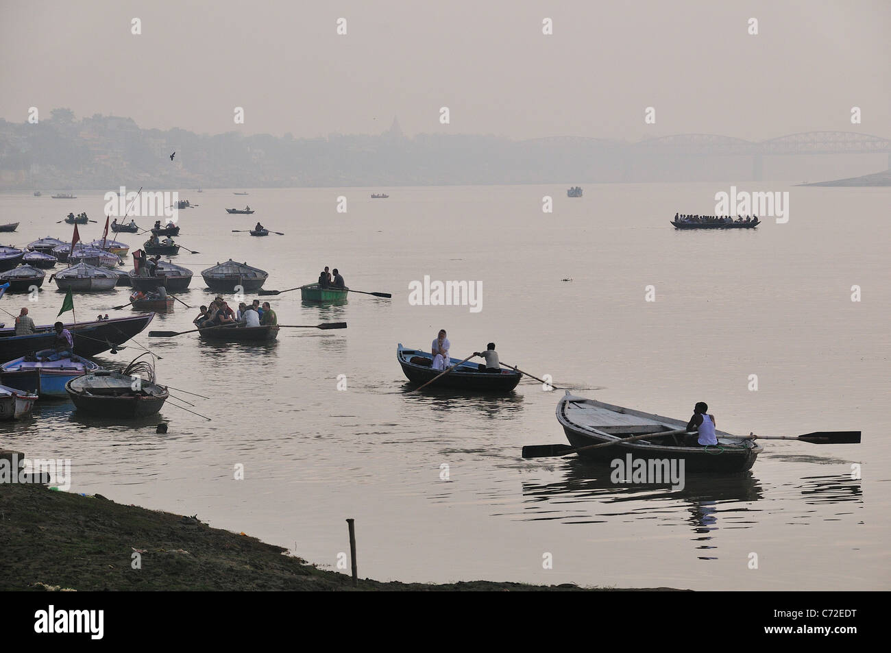 Pilgrims on the boat early morning at Ganges river Stock Photo - Alamy