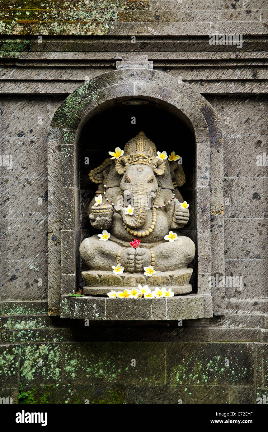 ganesh hindu god figure in bali indonesia temple Stock Photo - Alamy