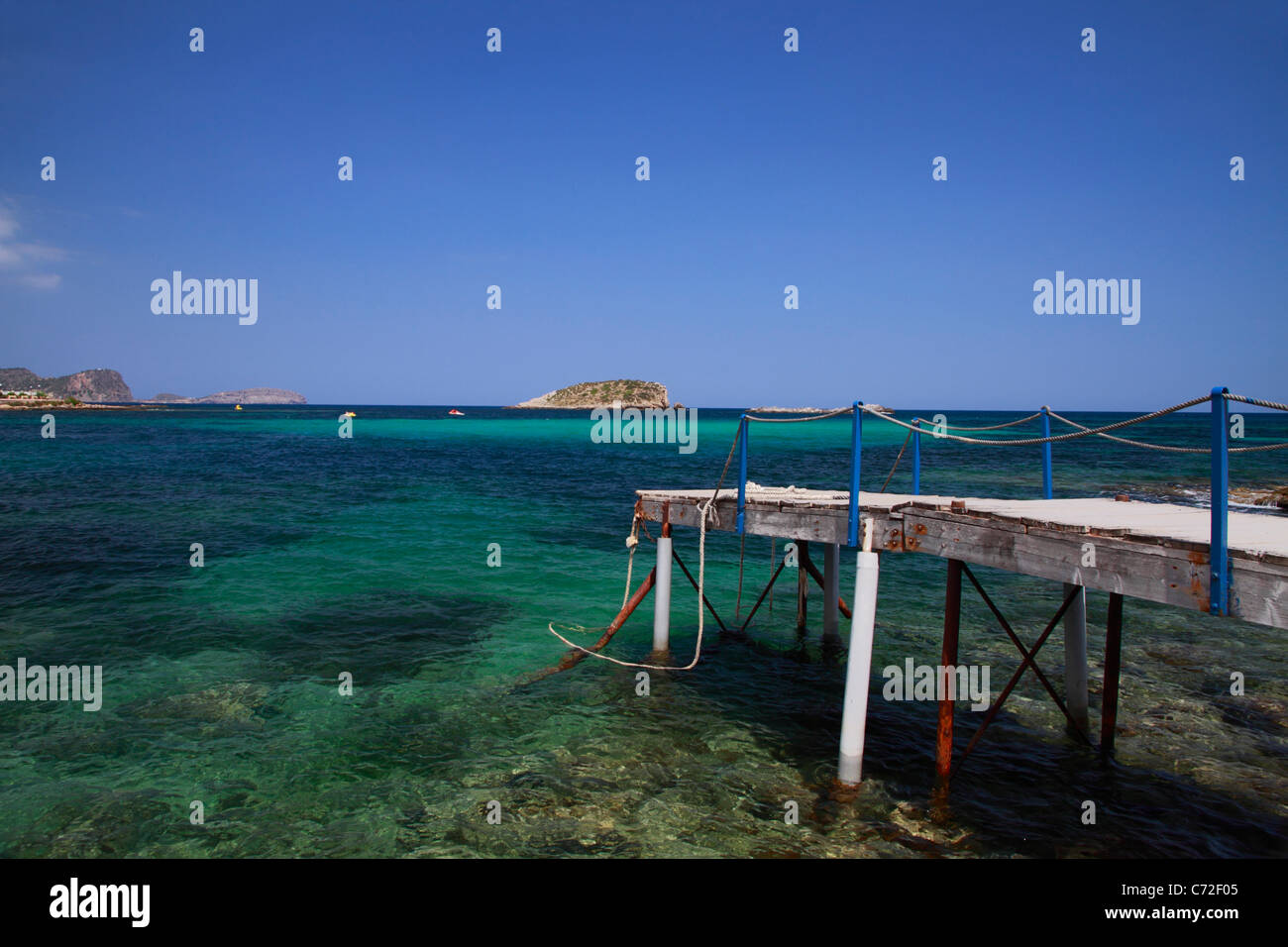 Ferryboat jetty at the beach of Es Canar, Ibiza, Spain Stock Photo - Alamy
