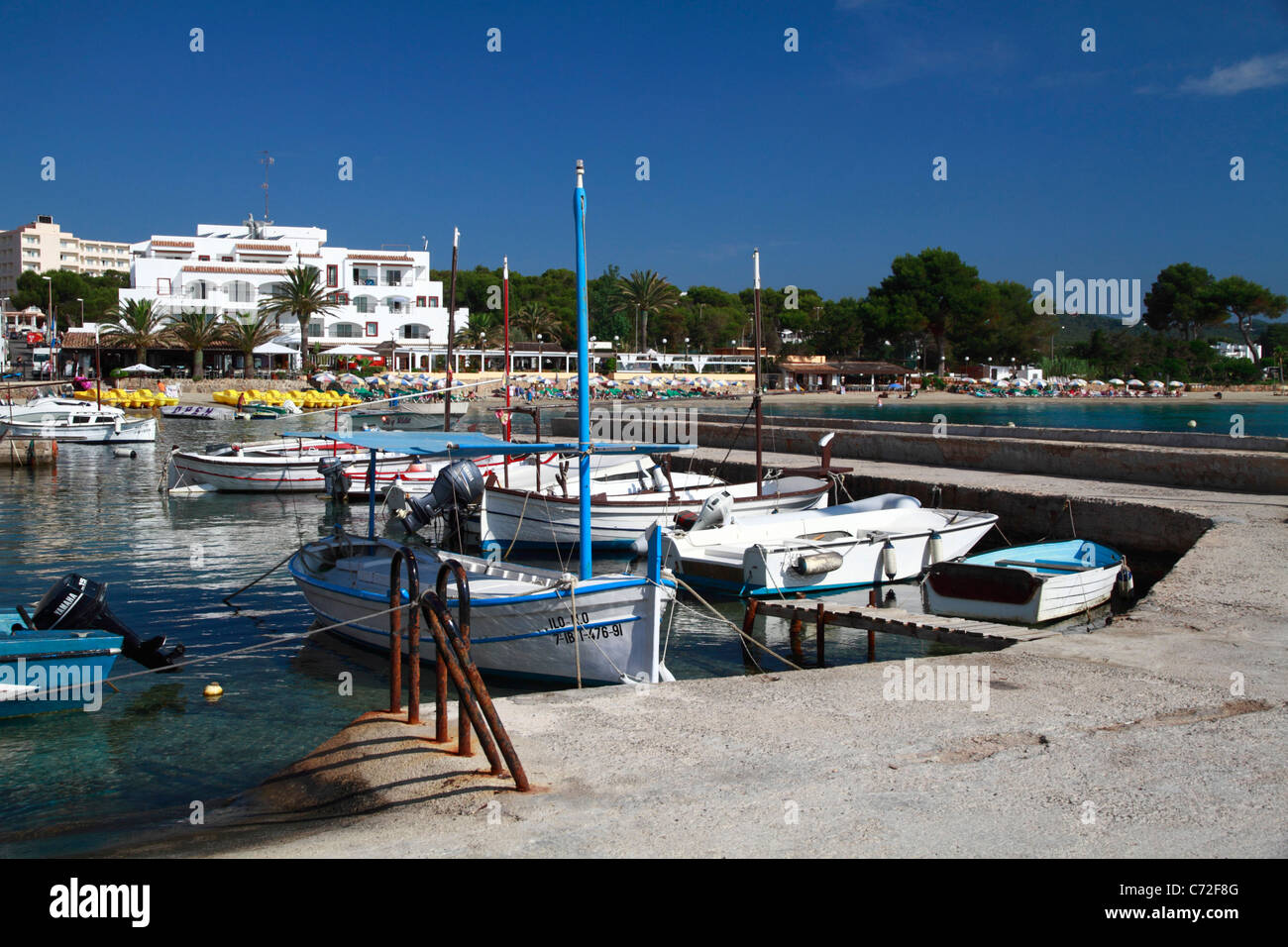 Fishing boats moored at the beach of Es Canar, Ibiza, Spain Stock Photo ...
