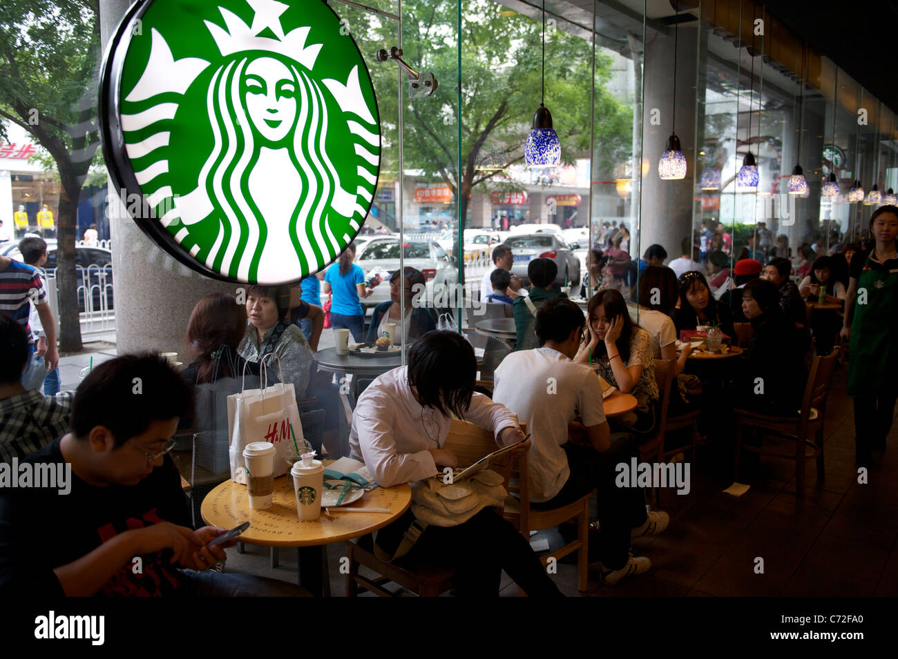 A Starbucks coffee shop in downtown Beijing, China. 11-Sep-2011 Stock ...