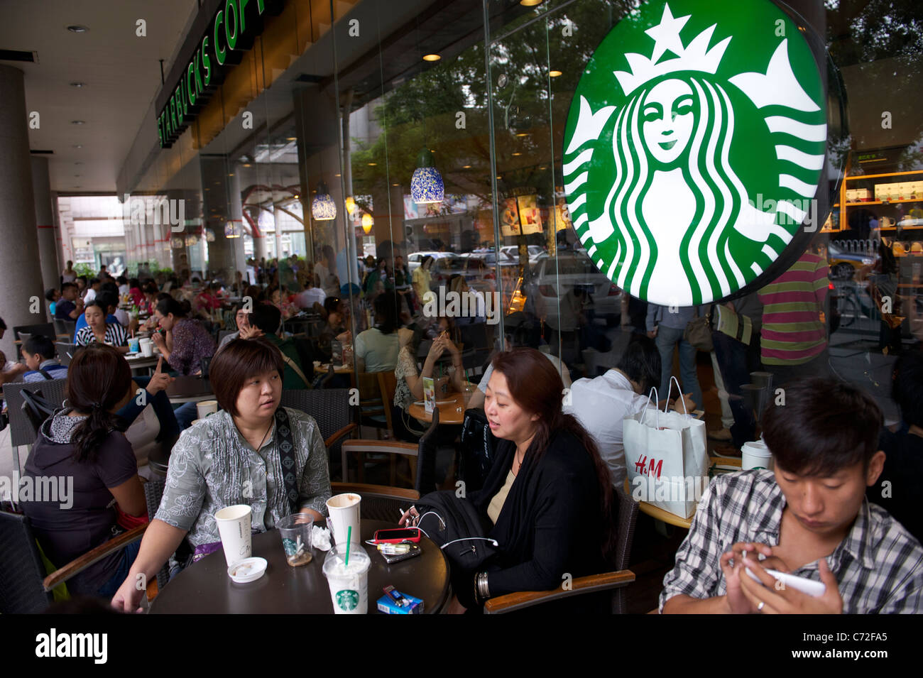 A Starbucks coffee shop in downtown Beijing, China. 11-Sep-2011 Stock ...