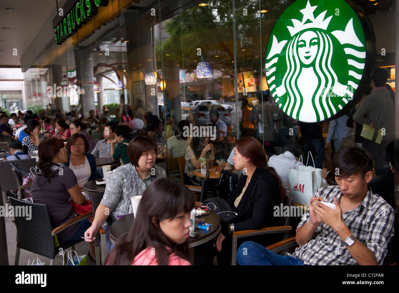 A Starbucks coffee shop in downtown Beijing, China. 11-Sep-2011 Stock ...