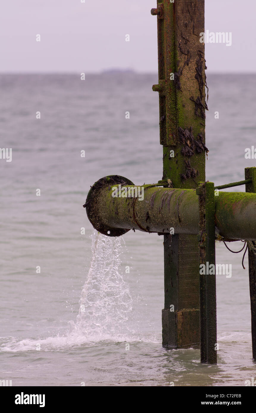 A waster water outflow pipe into the sea near Sheringham Norfolk ...