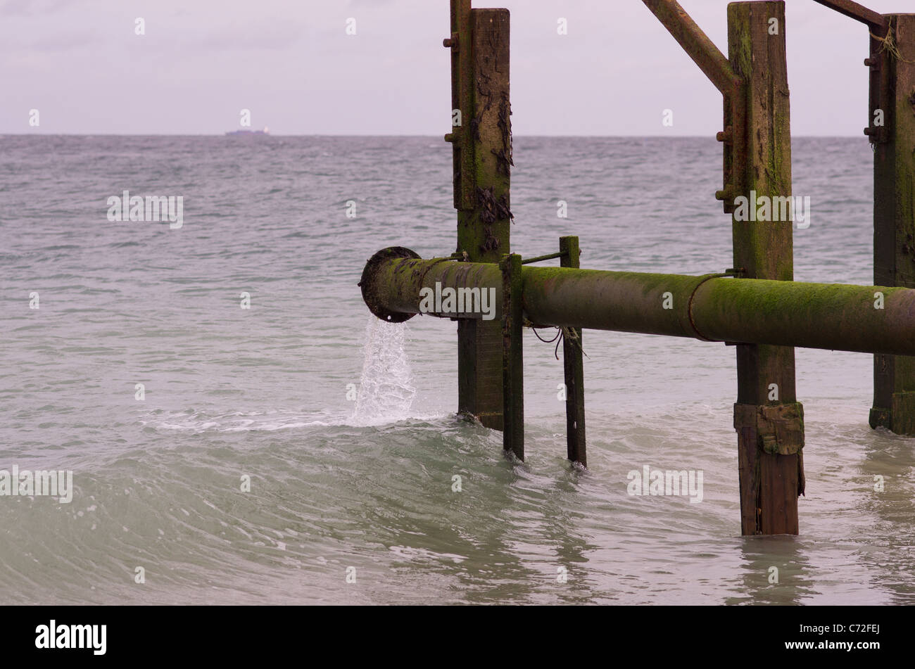 A waster water outflow pipe into the sea near Sheringham Norfolk ...