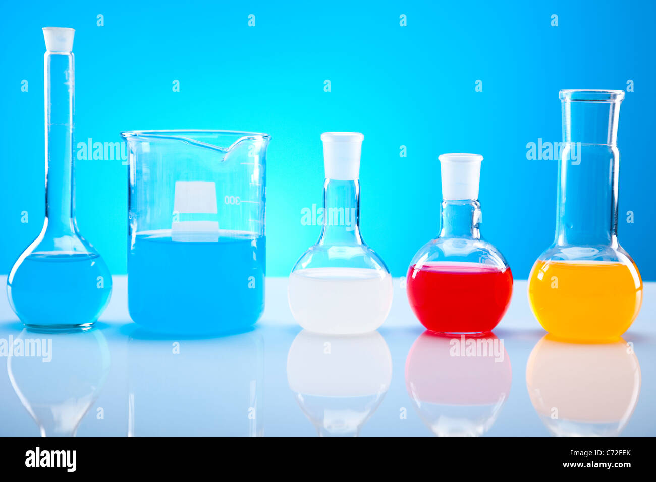 Laboratory glassware containing colorful liquid Stock Photo - Alamy