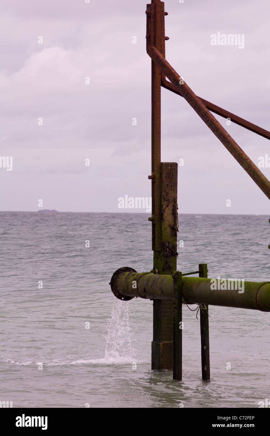 A waster water outflow pipe into the sea near Sheringham Norfolk ...