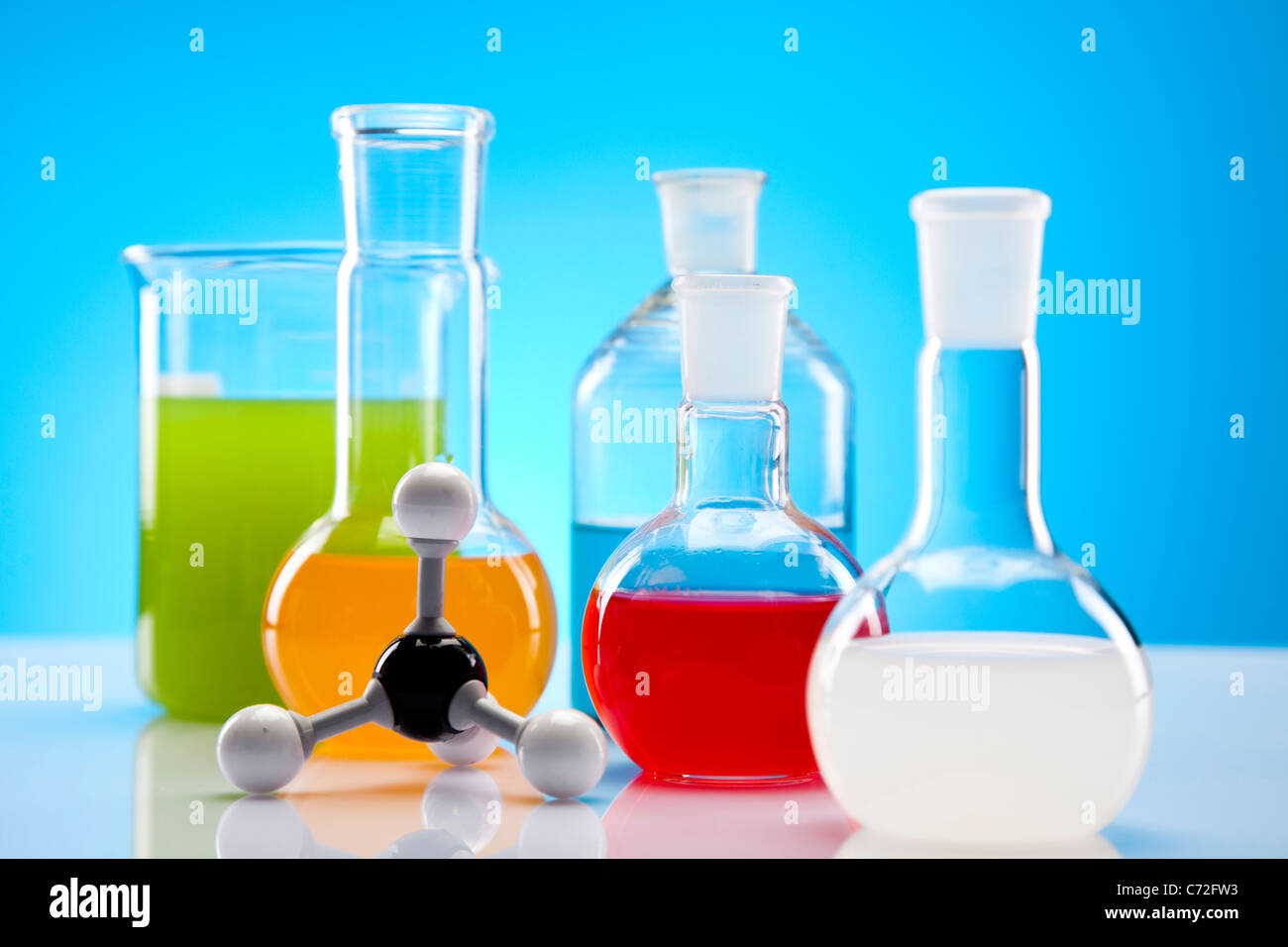 Molecular model and flasks in laboratory Stock Photo - Alamy