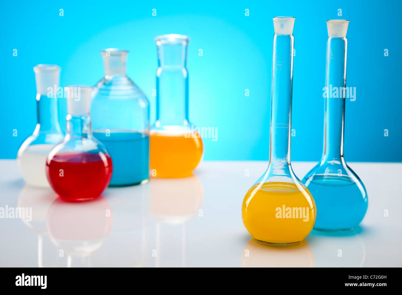 Laboratory flasks containing liquid color Stock Photo - Alamy