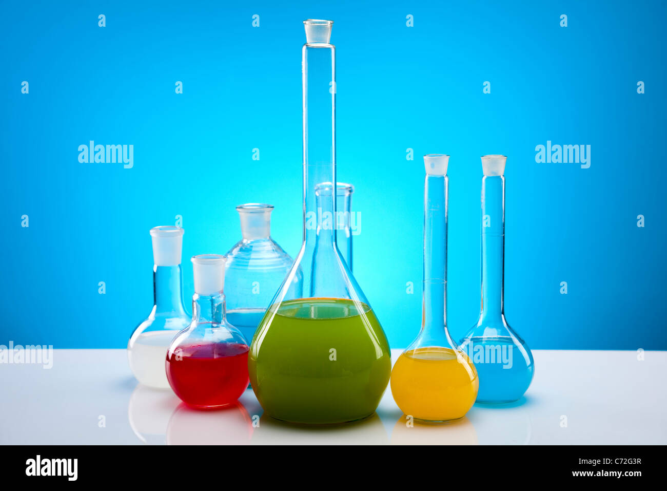 Laboratory glassware containing colorful liquid Stock Photo - Alamy