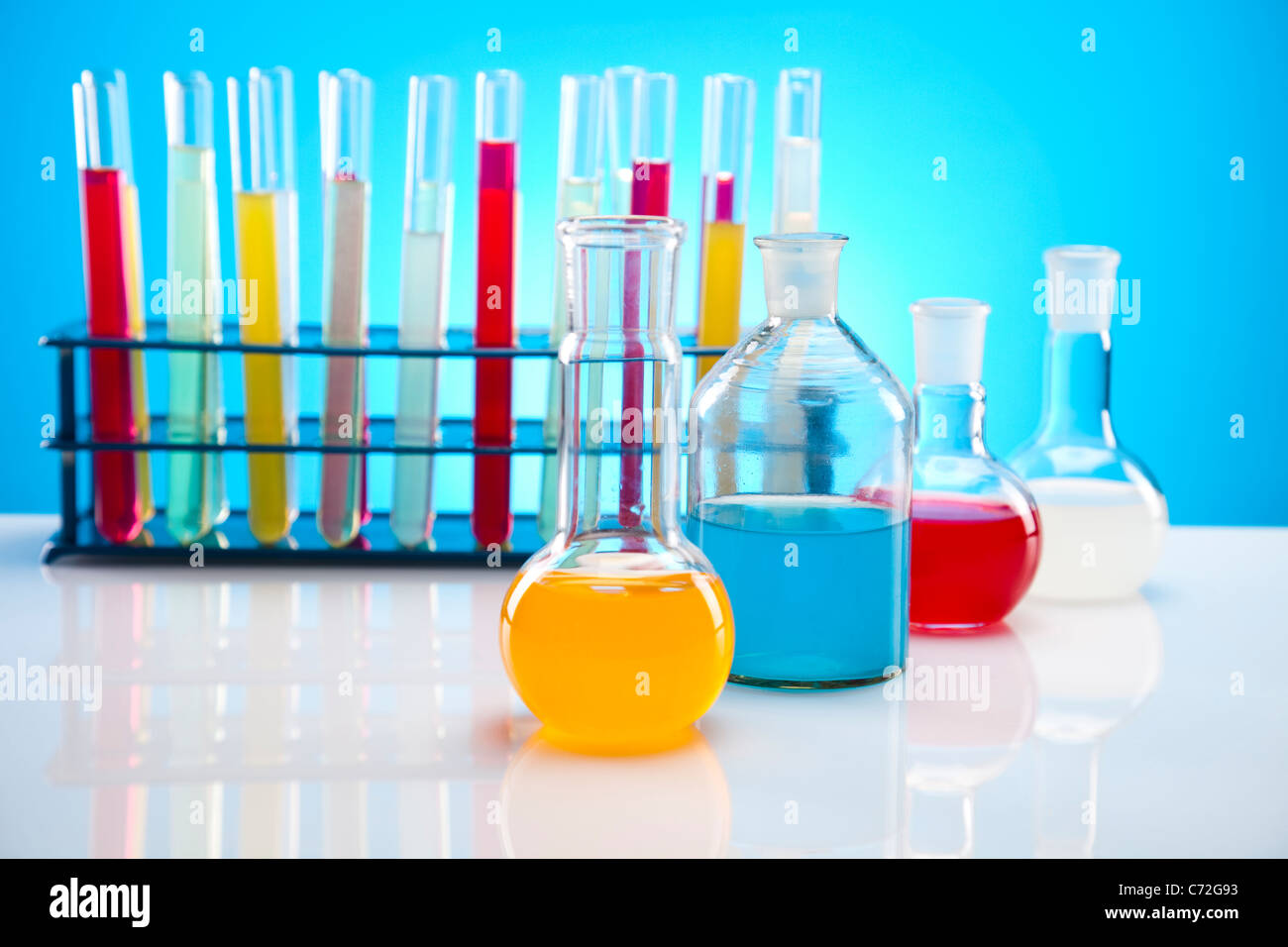Laboratory flasks with fluids of different colors Stock Photo - Alamy