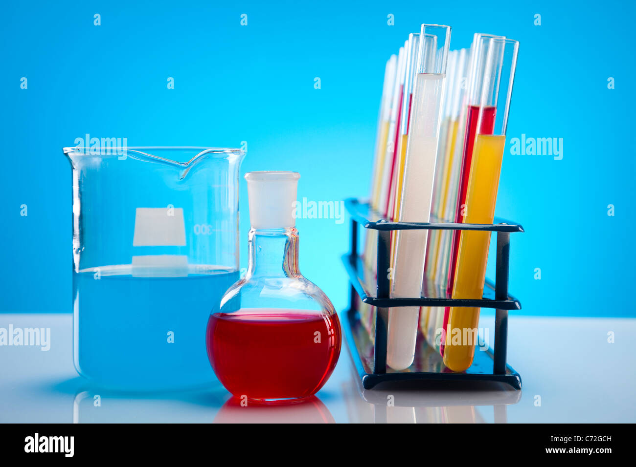 Laboratory flasks with fluids of different colors Stock Photo - Alamy