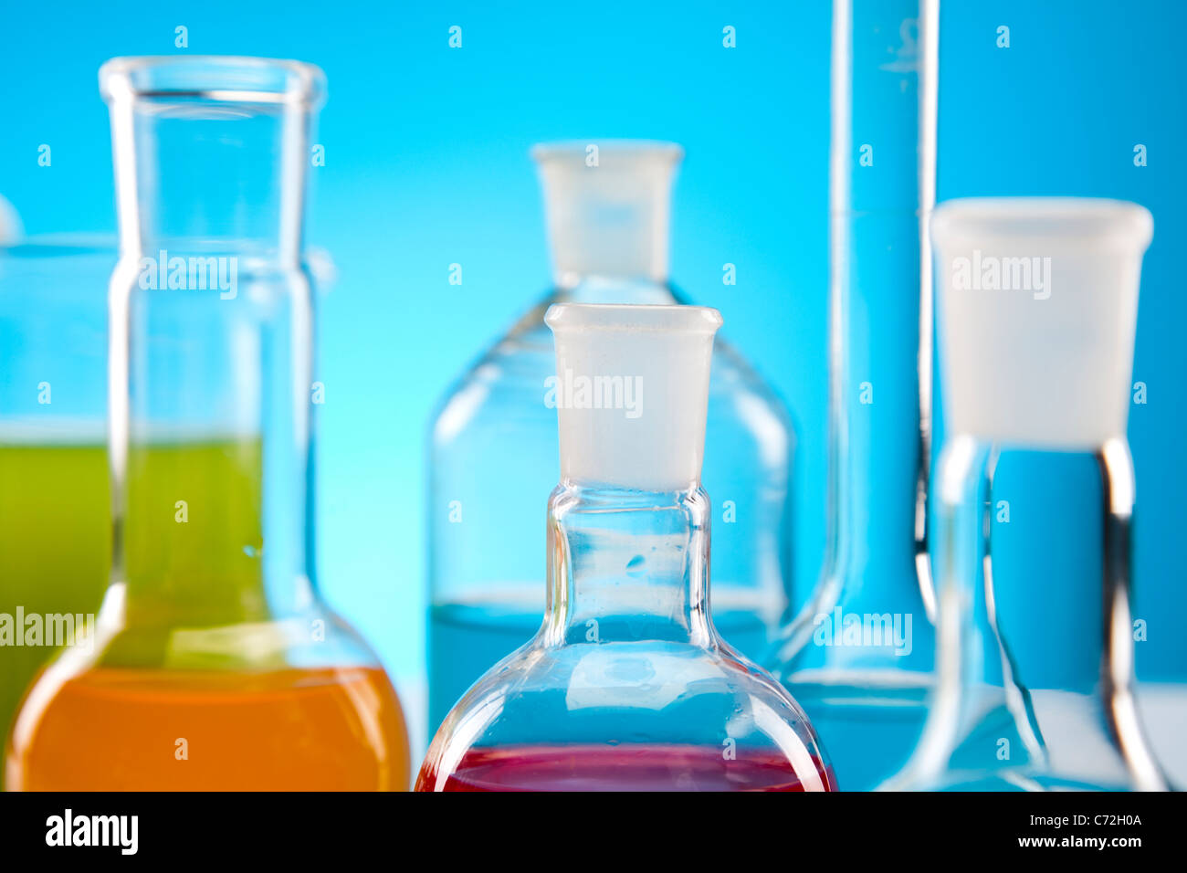 Laboratory glassware containing colorful liquid Stock Photo - Alamy