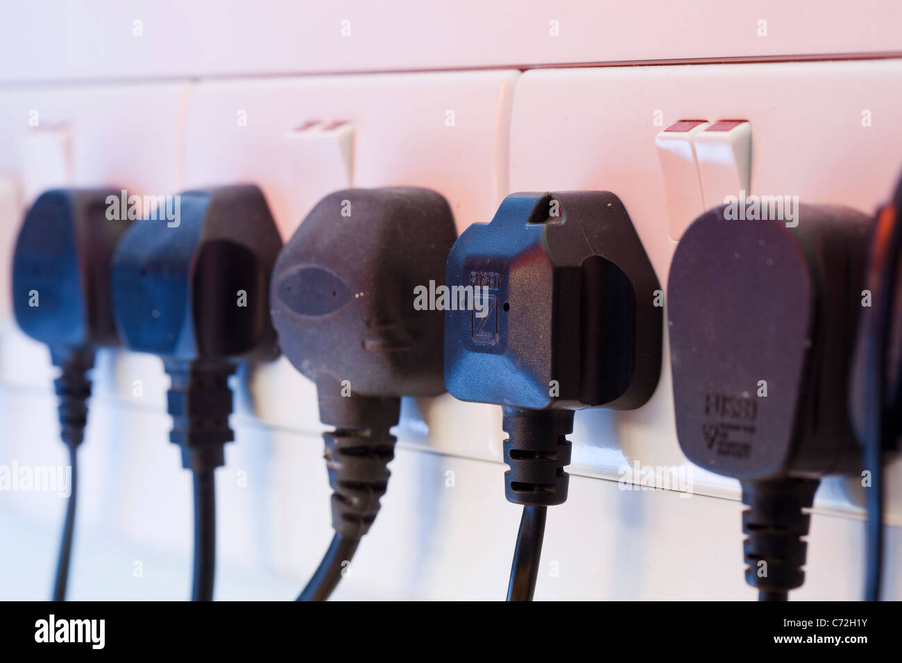 A row of electric sockets Stock Photo - Alamy