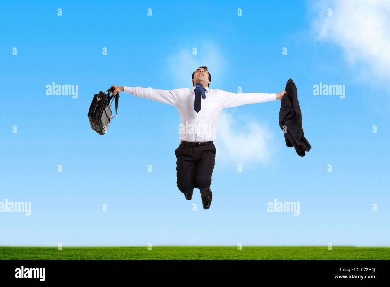 Person jumping in air office attire hi-res stock photography and images ...