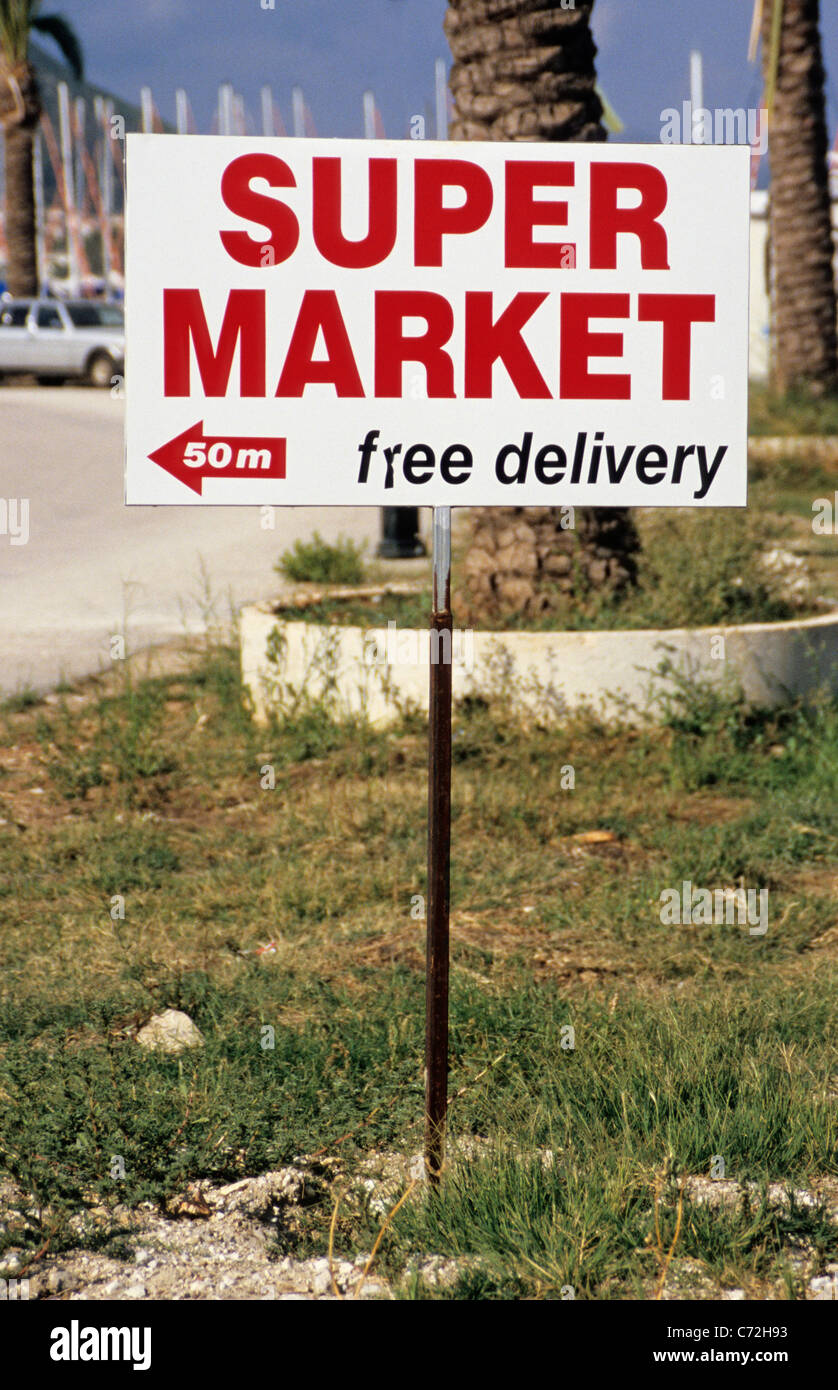 supermarket advertising signpost Stock Photo - Alamy