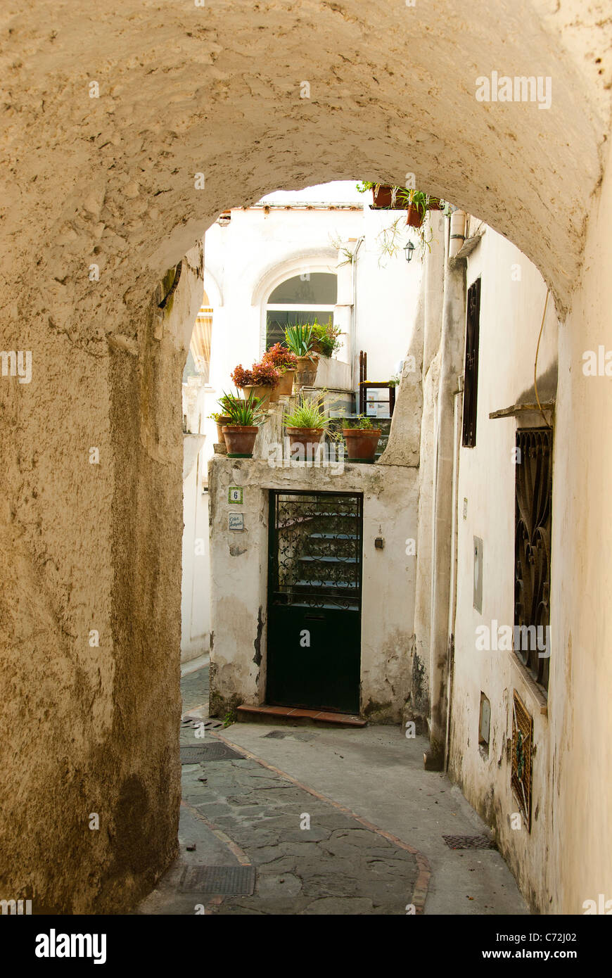 Quaint narrow alley in Capri Stock Photo - Alamy
