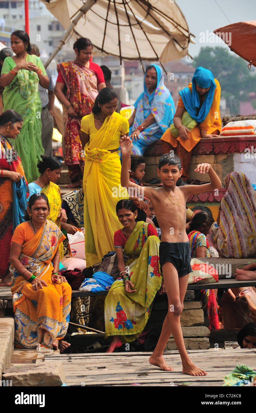 Pilgrim happy boy posing at the ghat by the Ganges river Stock Photo ...