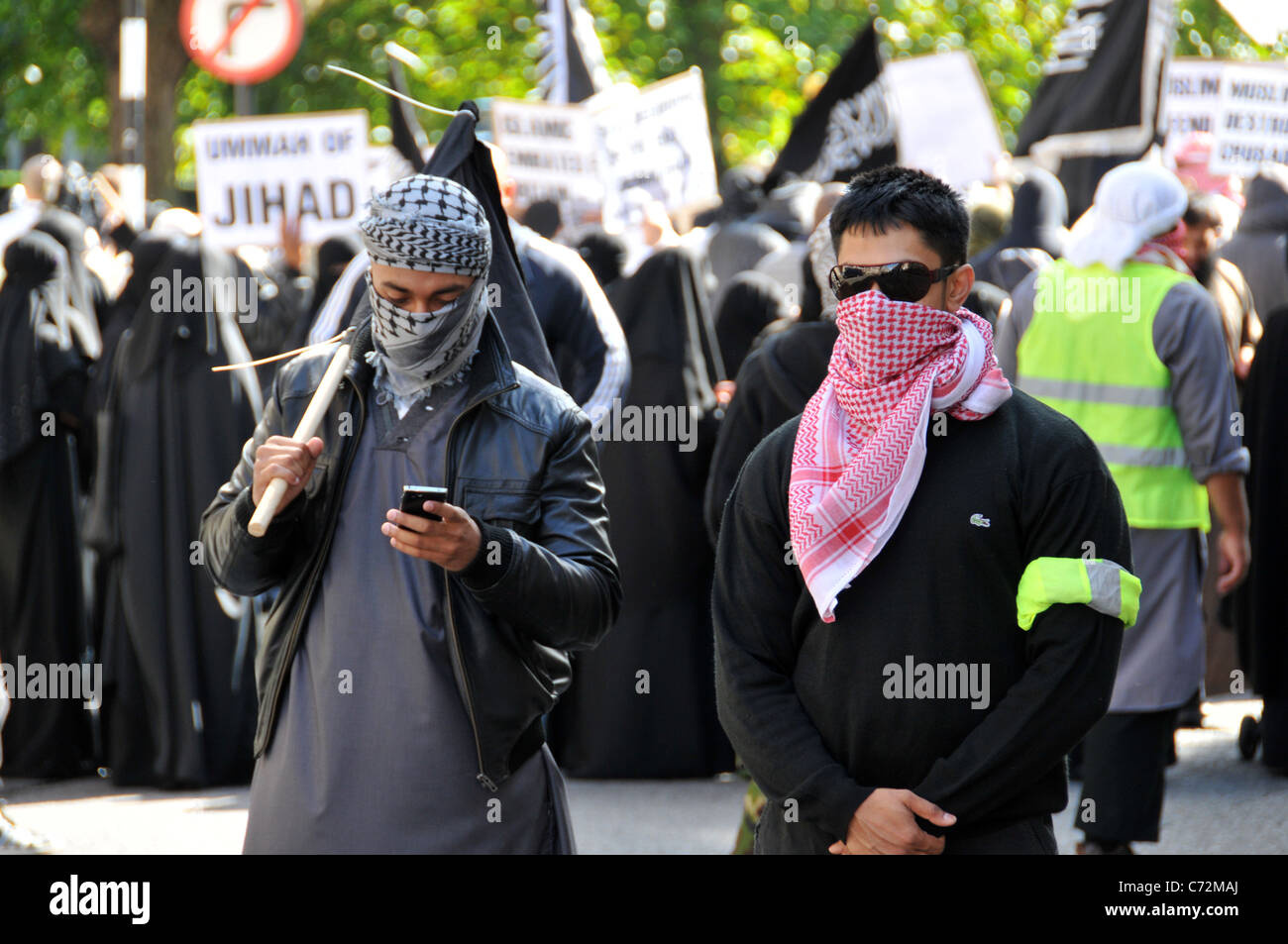 Muslim men masked 9/11 anniversary Muslim protesters outside US embassy ...
