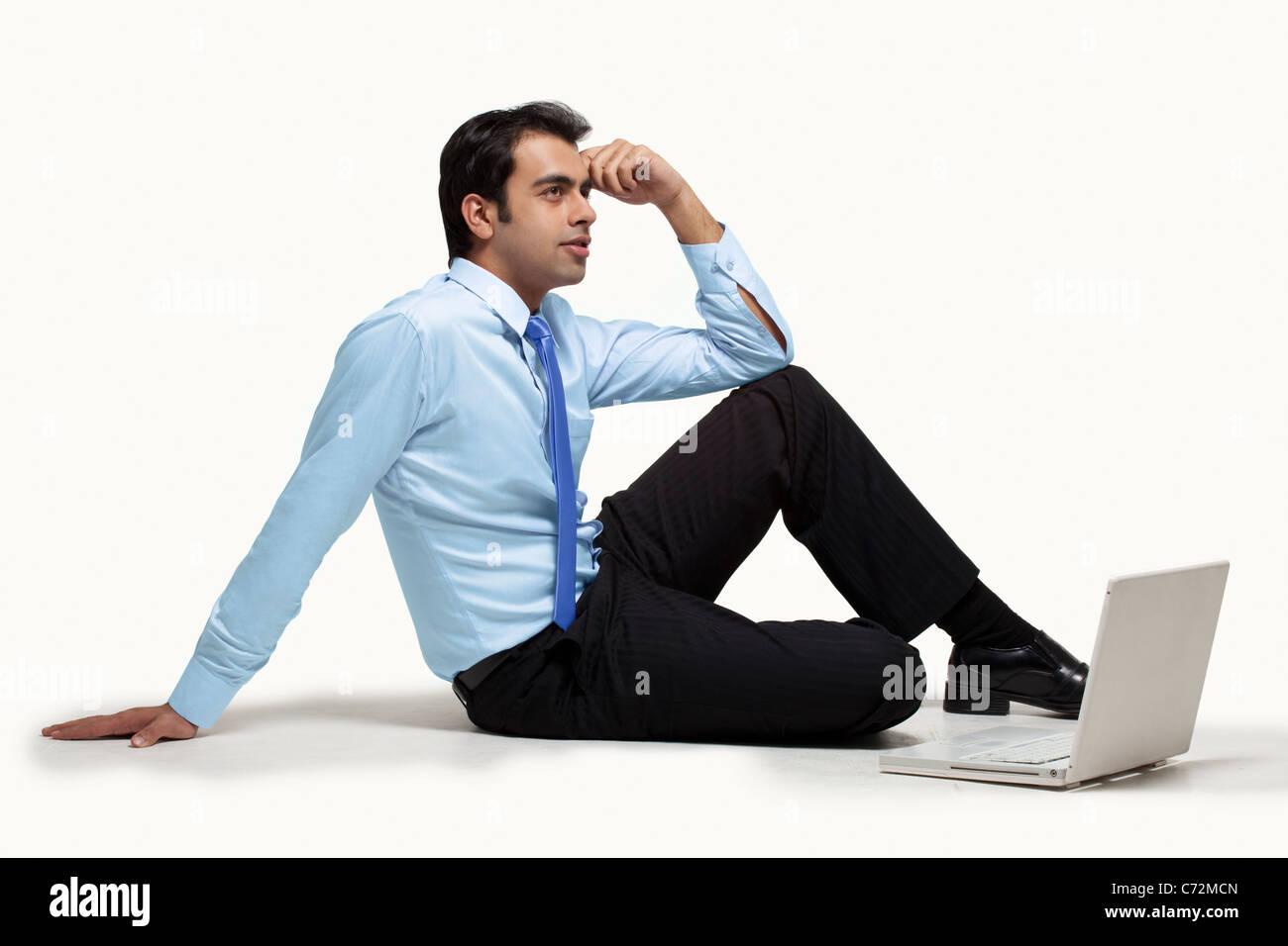 Asian corporate executive thinking Cut Out Stock Images & Pictures - Alamy