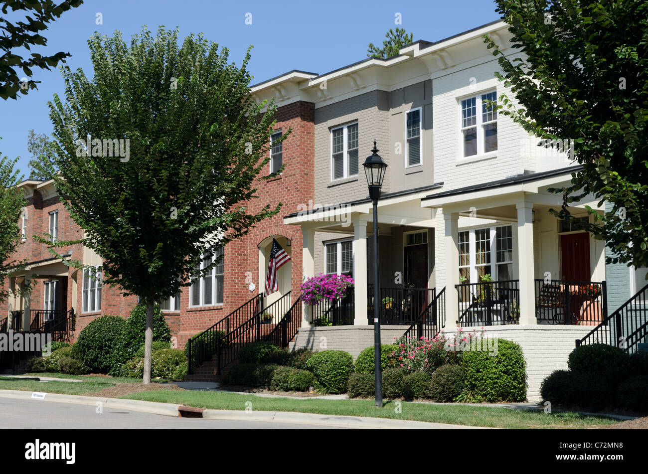 Town homes row neighborhood street Stock Photo - Alamy