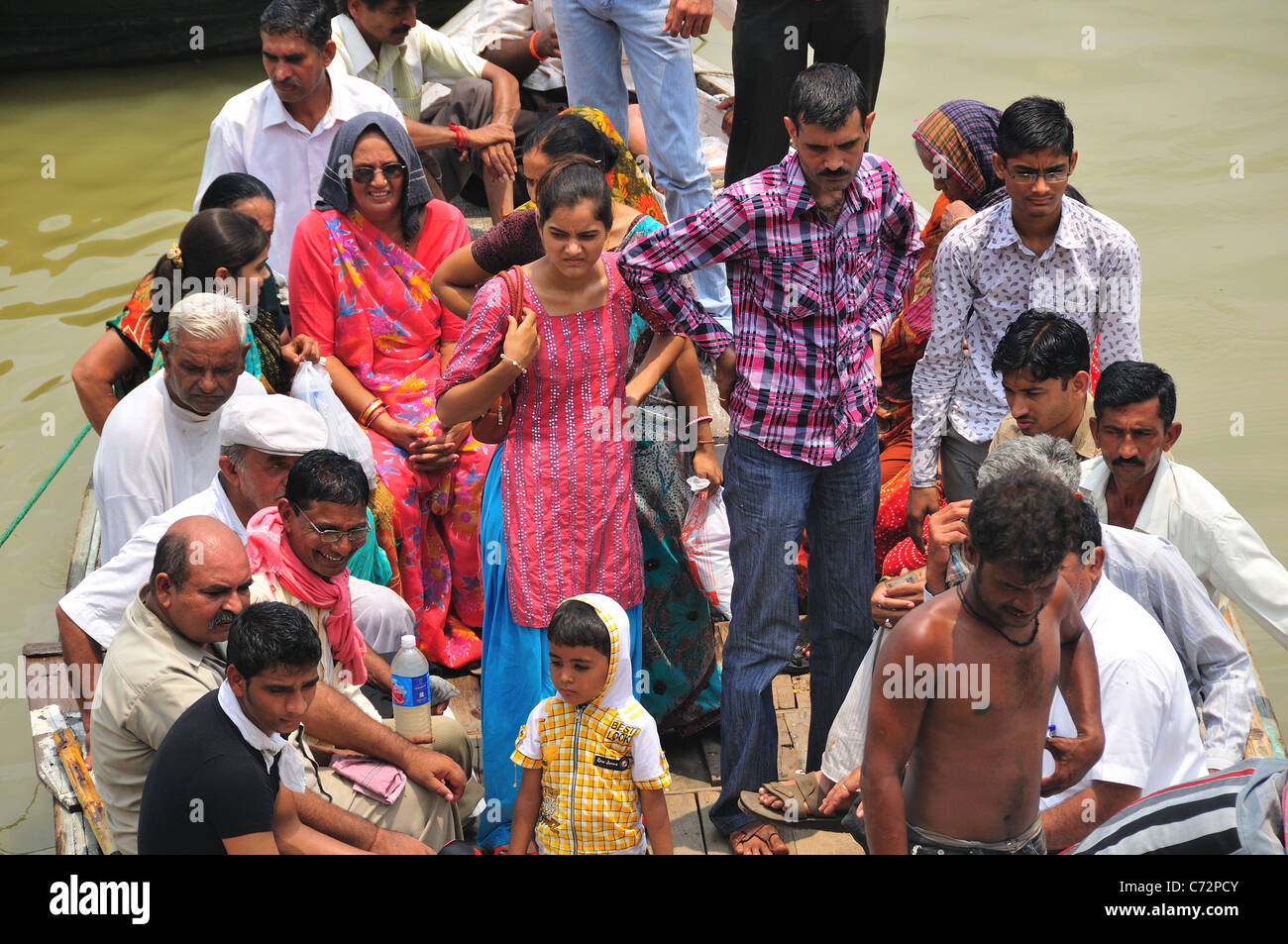 Pilgrims on the boat at Ganges river Stock Photo - Alamy