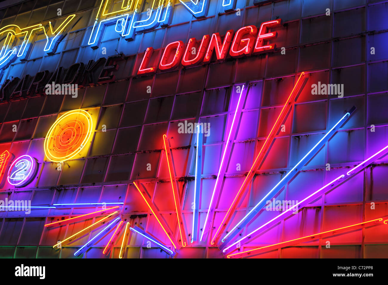 Neon lights of karaoke lounge sign Stock Photo - Alamy