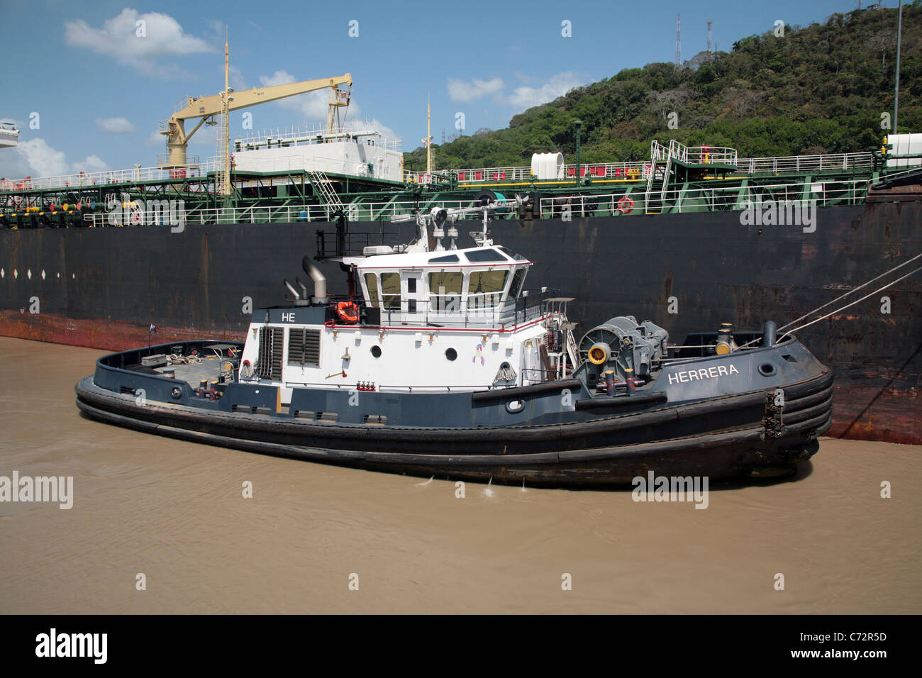 Tugboat operating in the Panama Canal on daytime operations Stock Photo ...