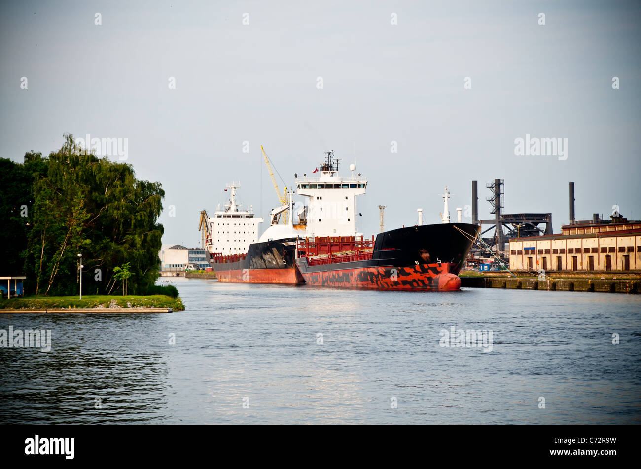 container ships in dockyard Stock Photo - Alamy