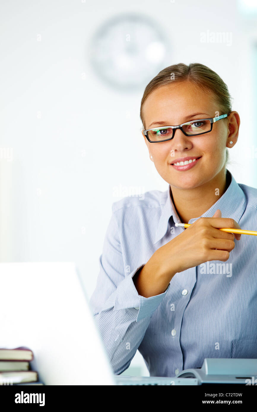 Portrait of pretty secretary looking at camera with smile Stock Photo ...