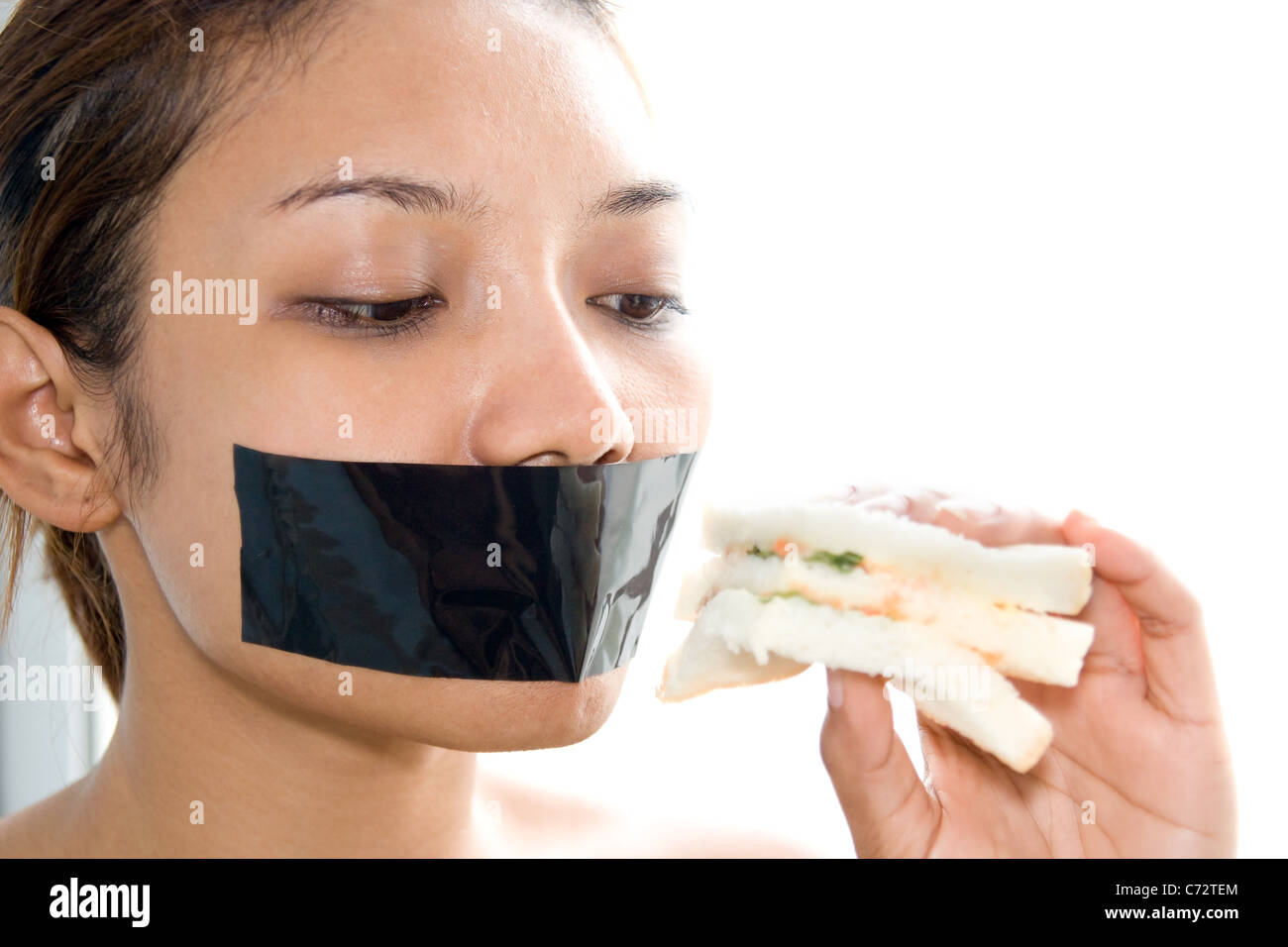 Young woman with toast Stock Photo - Alamy