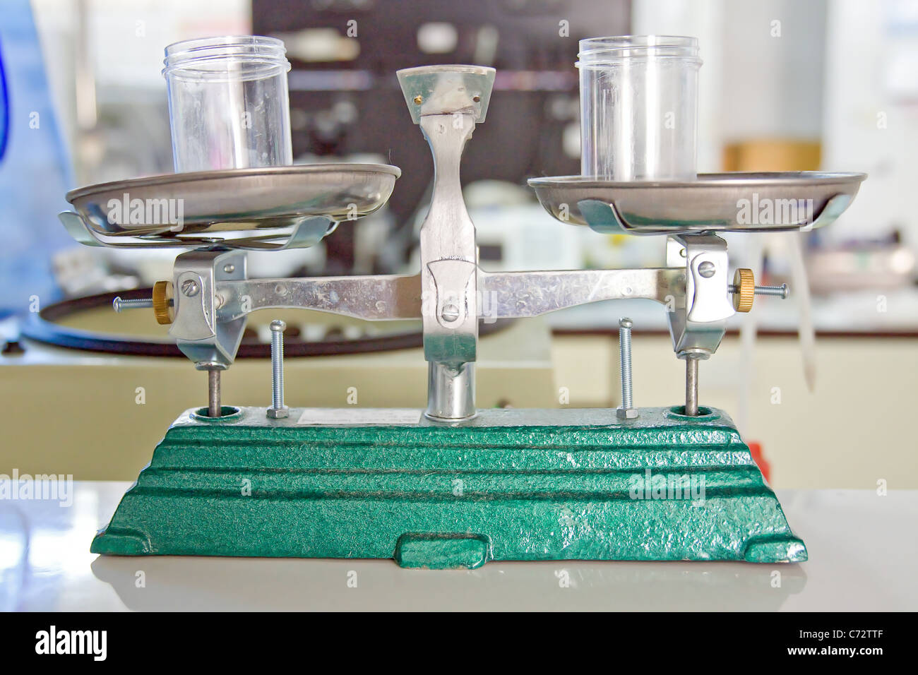 Laboratory scale with tube on table Stock Photo - Alamy