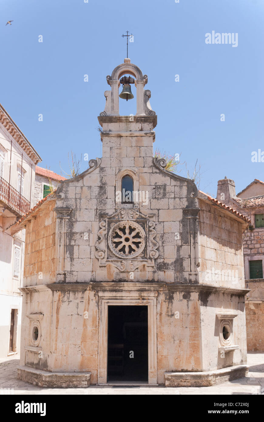 a church in the croatian city of vrboska on the island of hvar Stock ...