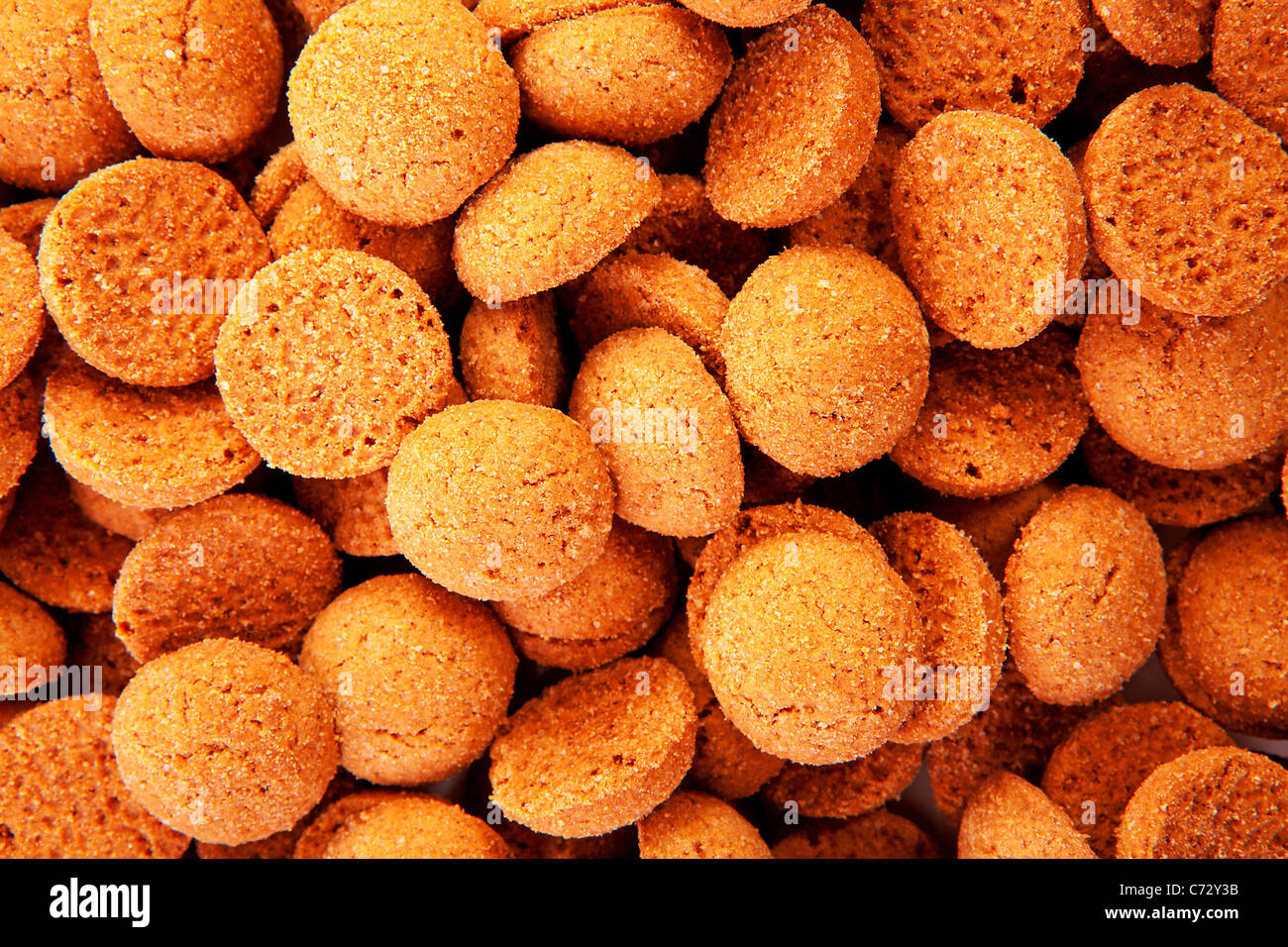 background of typical dutch sweets: pepernoten (ginger nuts) for a ...
